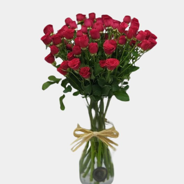 10 Stems Red Baby Roses in a Glass Vase| FloraKuwait.com